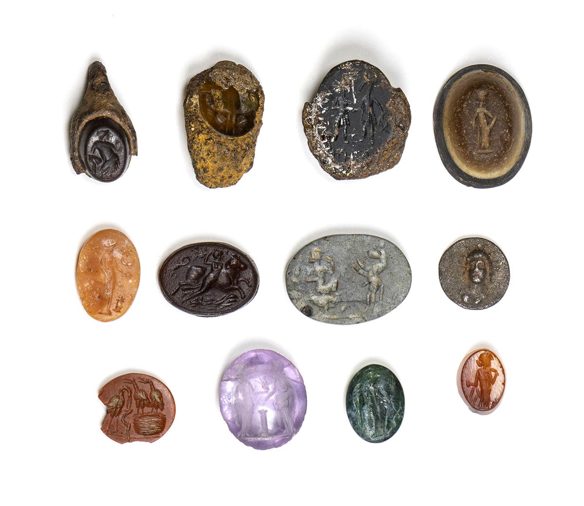 A GROUP OF ROMAN INTAGLIOS (12 ELEMENTS). ... - Bertolami Fine Art