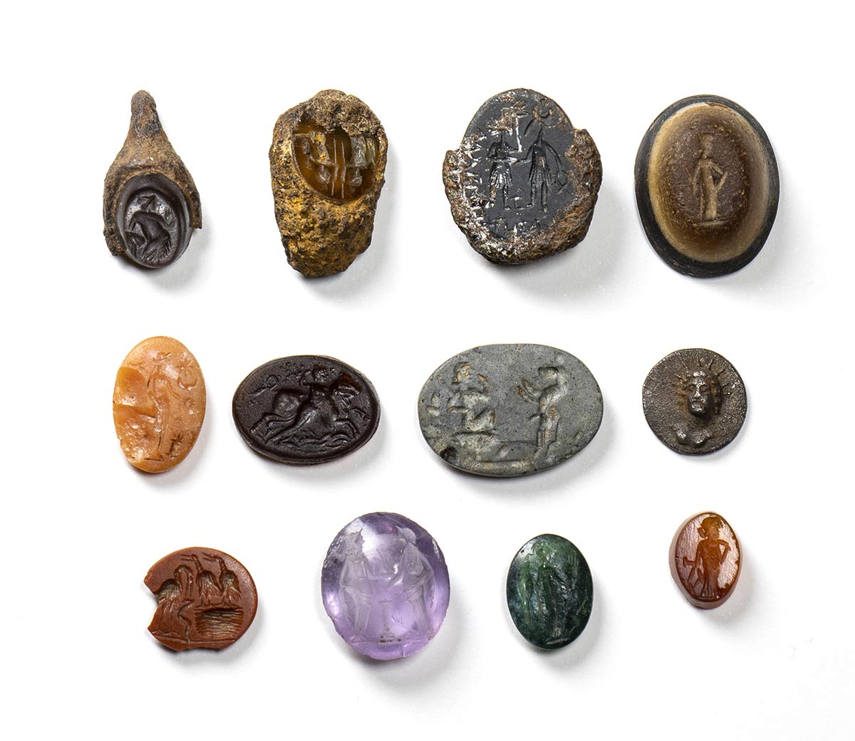 A GROUP OF ROMAN INTAGLIOS (12 ELEMENTS). ... - Bertolami Fine Art