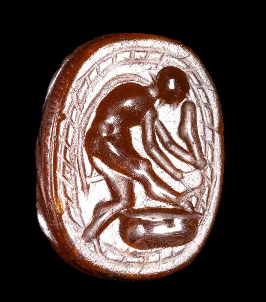 AN ETRUSCAN CARNELIAN SCARAB. MALE FIGURE AT THE ... - Bertolami Fine Art