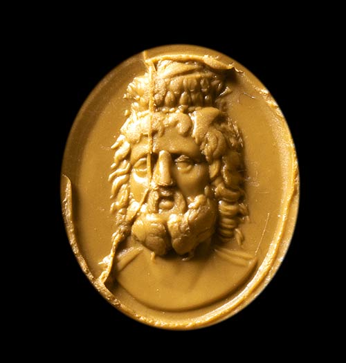 A ROMAN SARD INTAGLIO SET IN A LATER GOLD RING. ... - Bertolami Fine Art