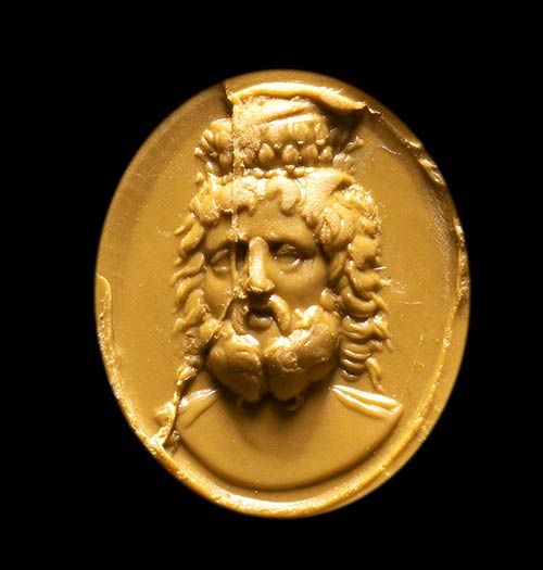 A ROMAN SARD INTAGLIO SET IN A LATER GOLD RING. ... - Bertolami Fine Art